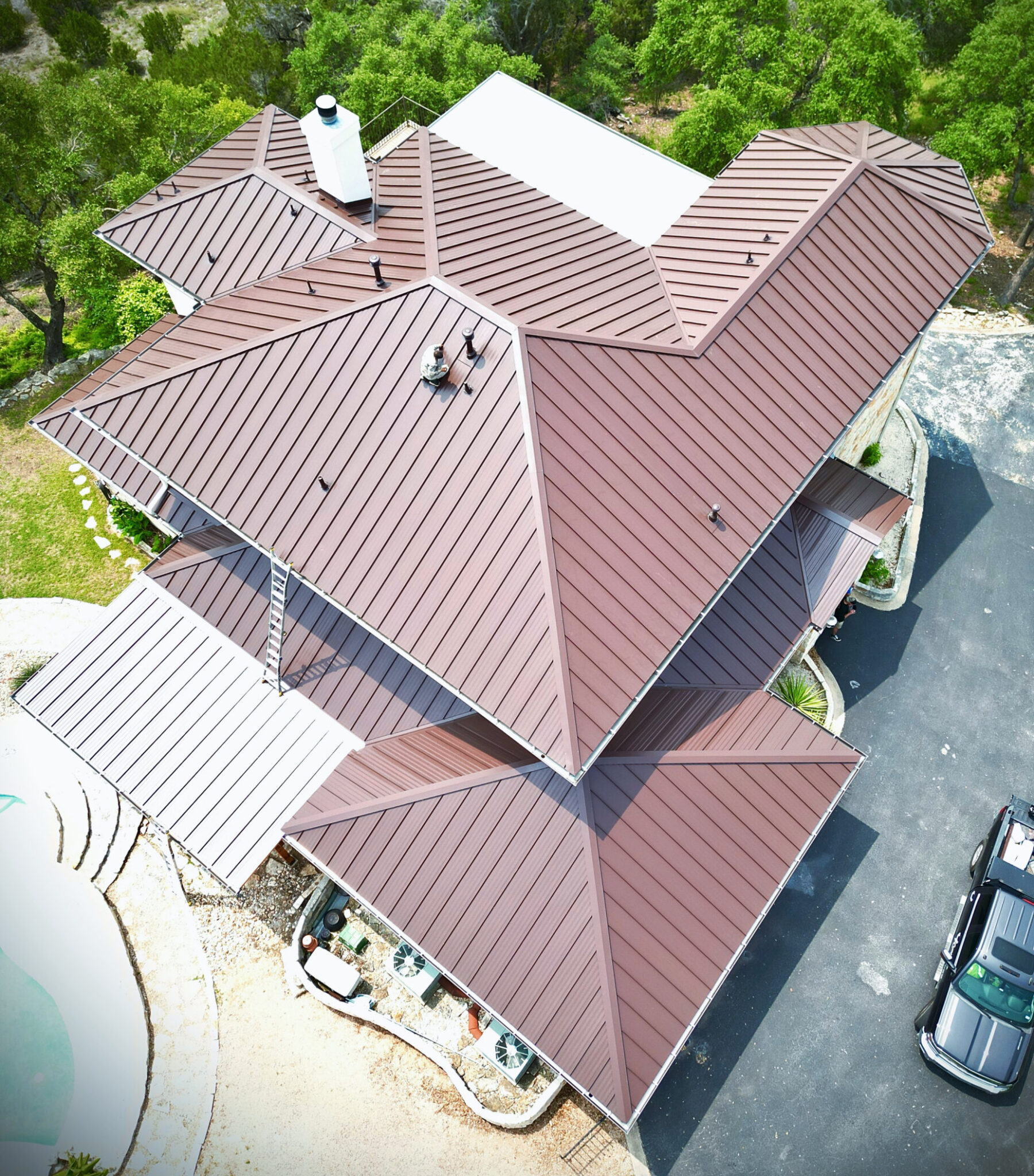 Metal Roof vs Shingles Cost in Austin 2025 | Comanche Roofing